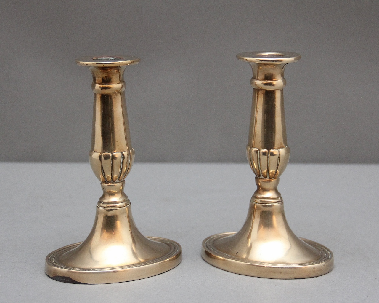 A pair of brass Georgian candlesticks | Martlesham Antiques